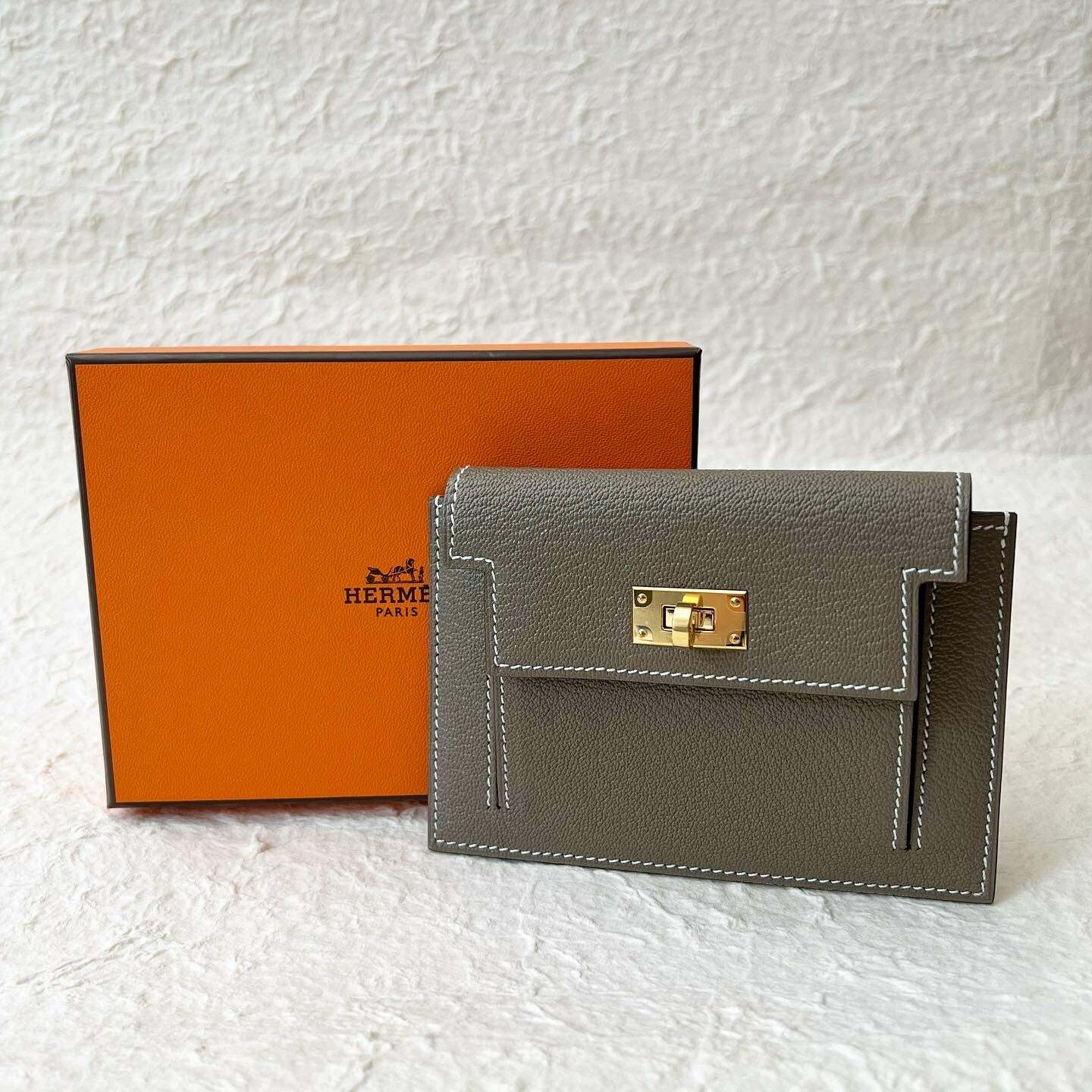 HERMES Kelly Pocket (Etoupe x Gold)