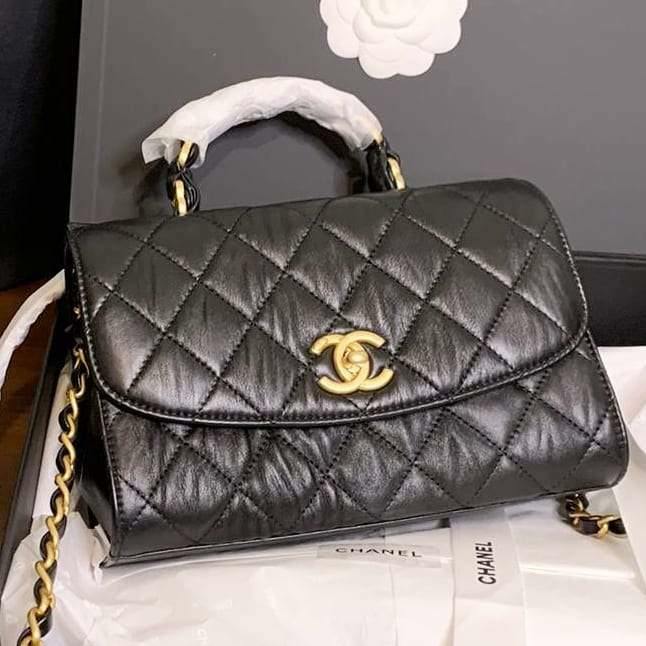 CHANEL Flap Bag with Top Handle