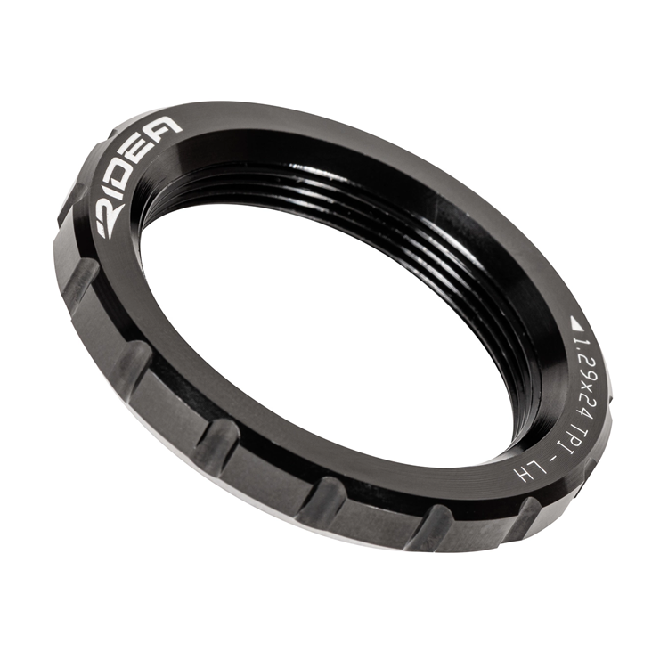 Track sprockets locking ring