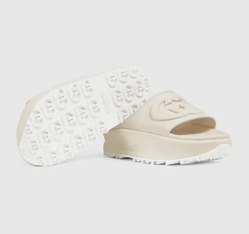Gucci logo embossed flatform slides