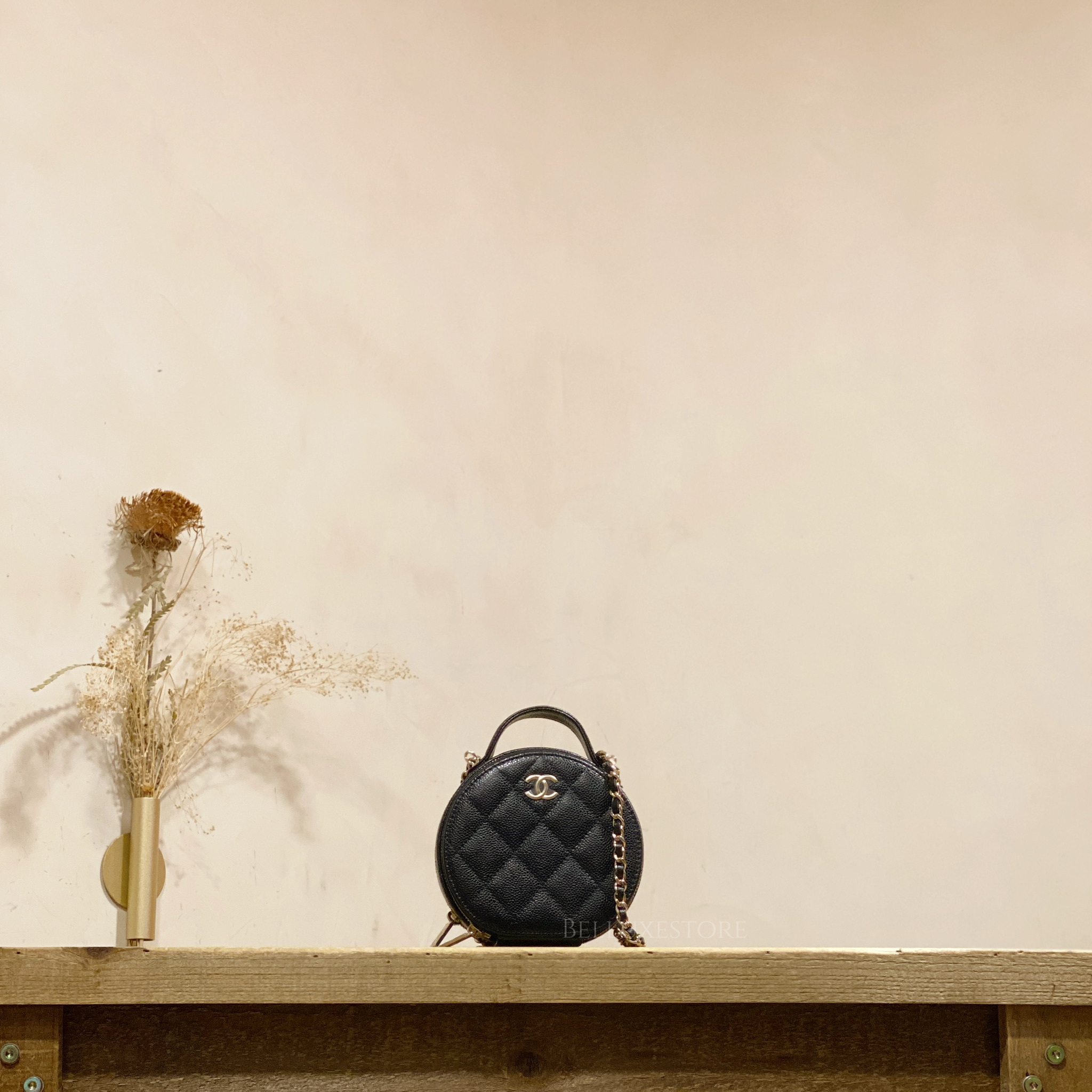 [Unused] Chanel mini round bag with handel caviar b...