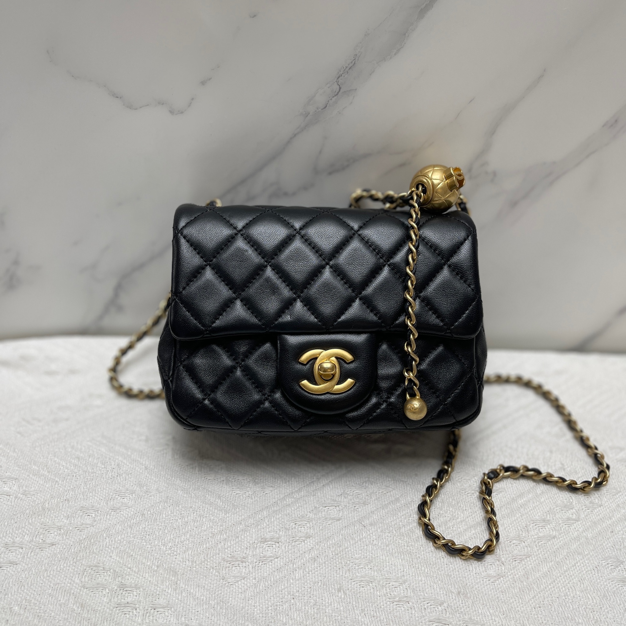 Chanel mini flap with gold ball