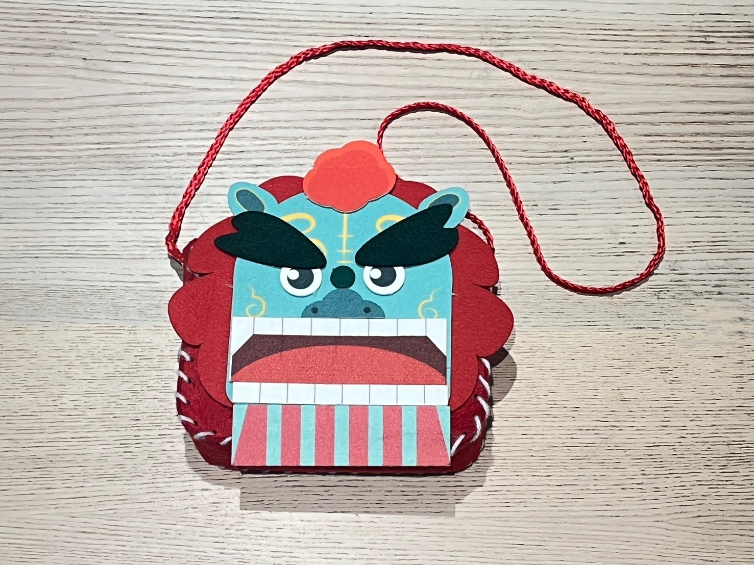 方口獅斜背包